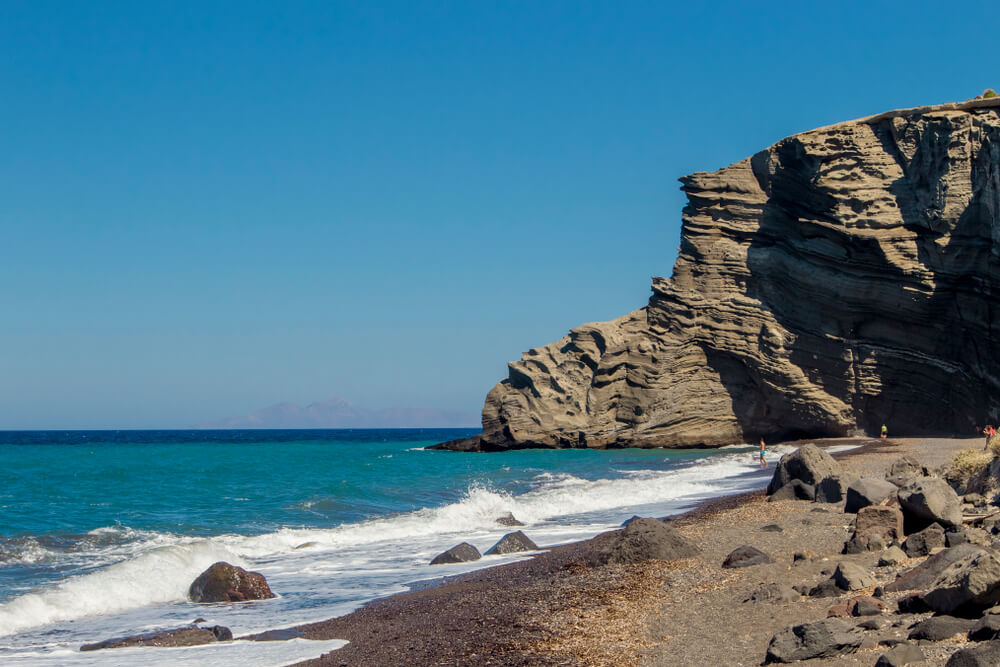 8 Enchanting Black Sand Beaches in Santorini, Greece - Bookaway